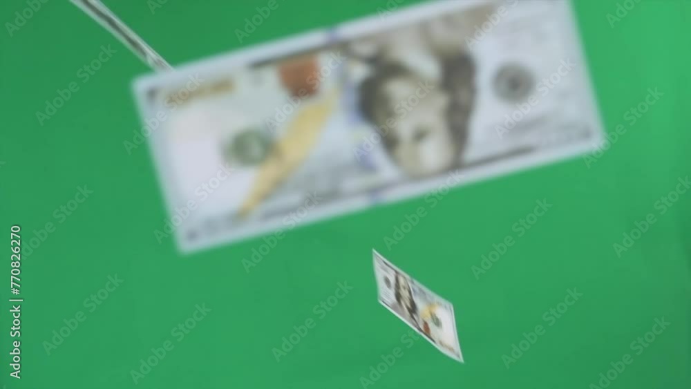 Shower of US 100 dollar bills on green screen background, fortune ...