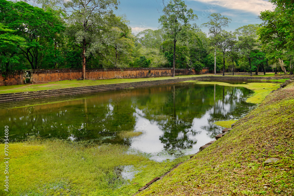Baphuon Temple pool near the 11th century Shiva temple built by ...