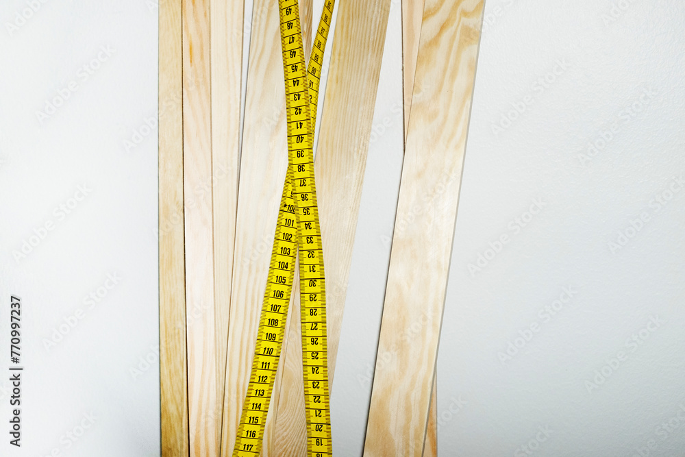 Wood sticks and measuring tape with hard direct flashlight Stock Photo ...