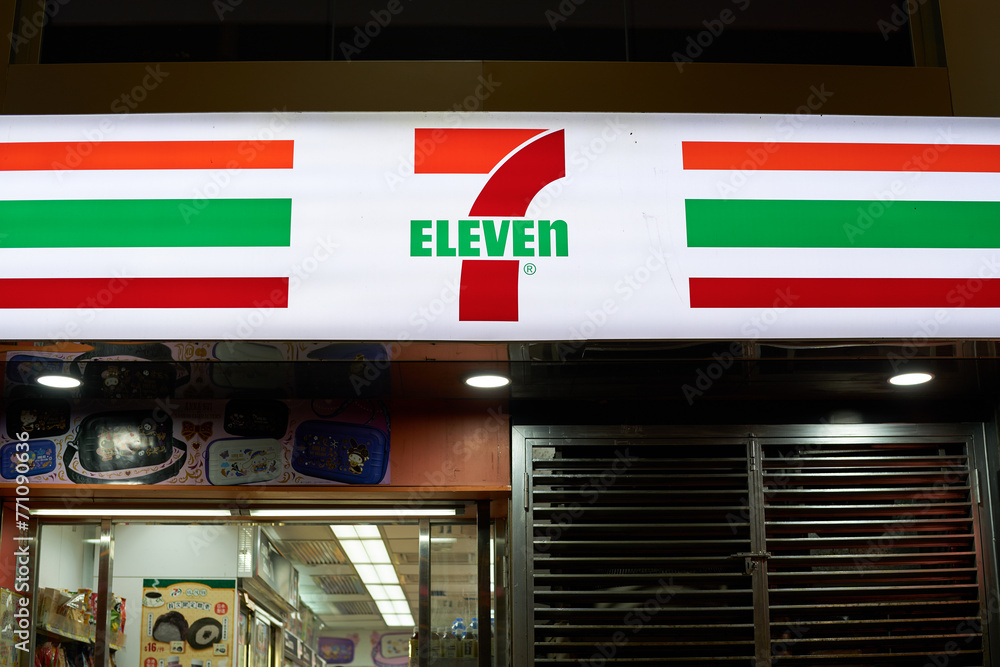 HONG KONG, CHINA - DECEMBER 05, 2023: close up shot of 7-Eleven sign as ...