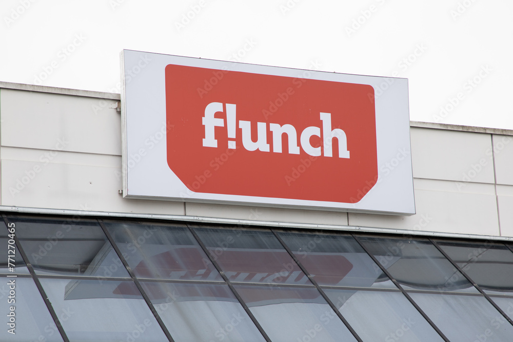 flunch f! entrance logo text and brand sign on facade restaurant chain ...