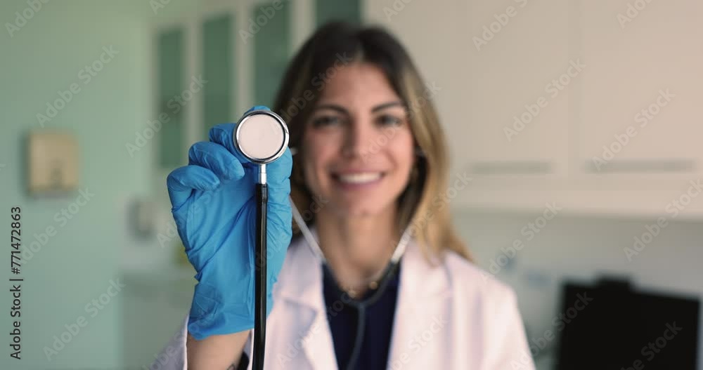 Woman cardiologist doctor hold stethoscope, provide healthcare services ...