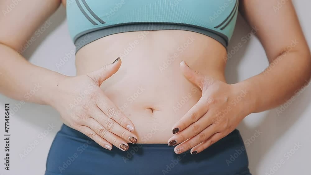 Women body fat belly. Obese woman hand holding excessive belly fat ...