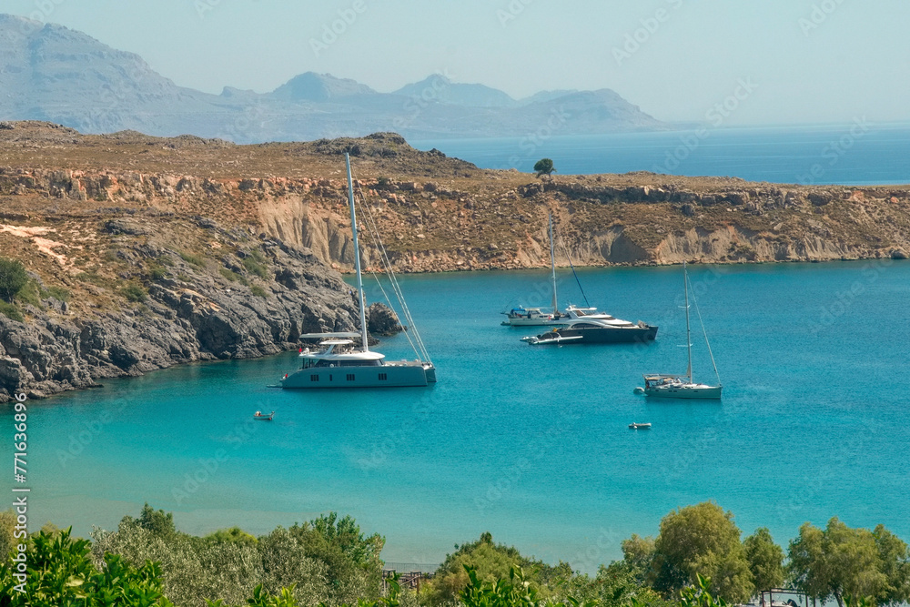 Greece, Rhodes island, Saint Paul's bay borders the town of Lindos. The ...