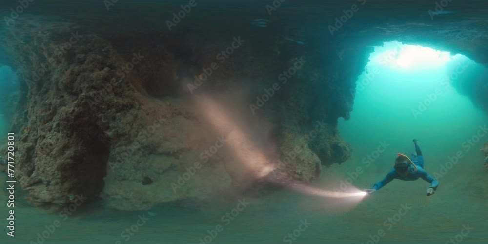 360 vr footage of the freediver. Man freediver swims underwater with ...