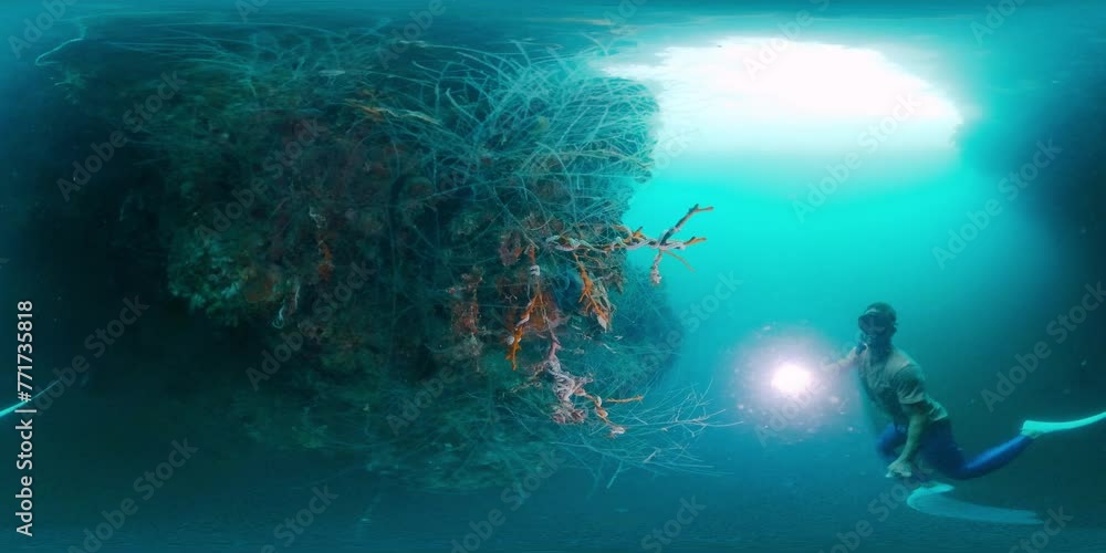 360 vr footage of the freediver. Man freediver swims underwater with ...
