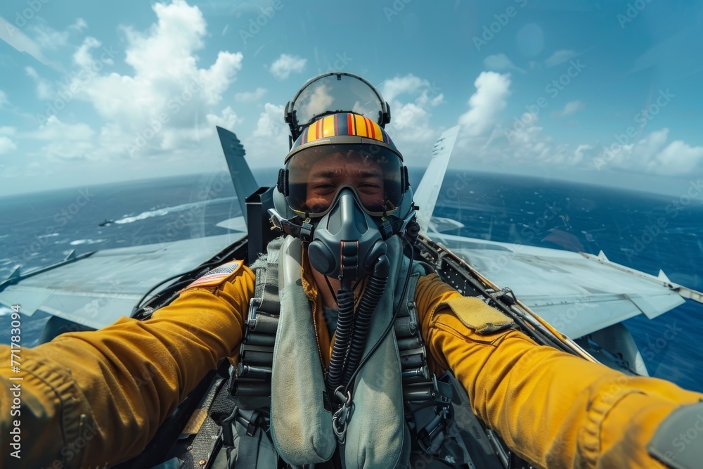 Close-up of a fighter jet pilot in flight gear sitting in the cockpit ...