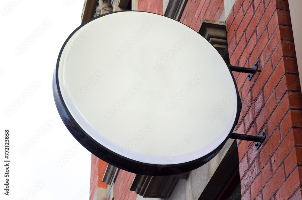 A blank white mockup background template of a circular lightbox mounted ...