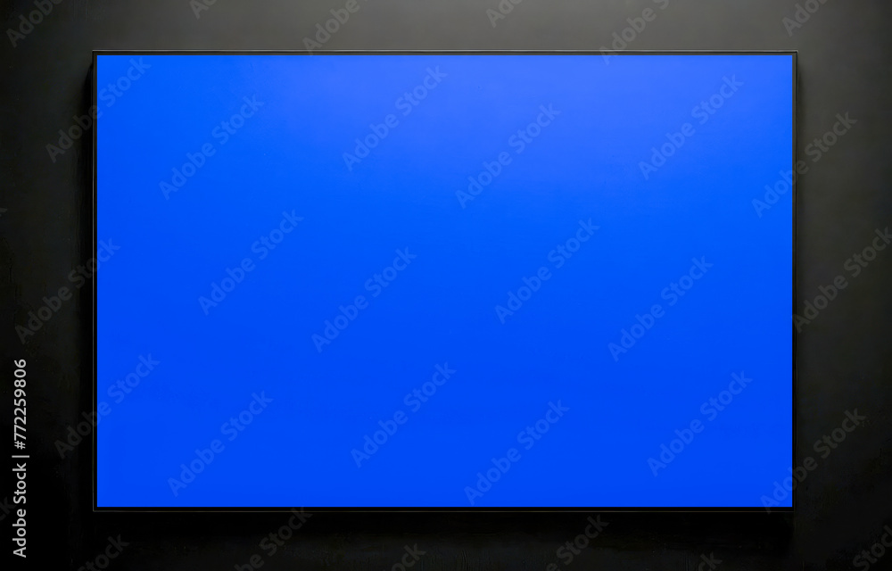 TV backdrop. black TV is hanging on wall in dark room. mockup of blue ...