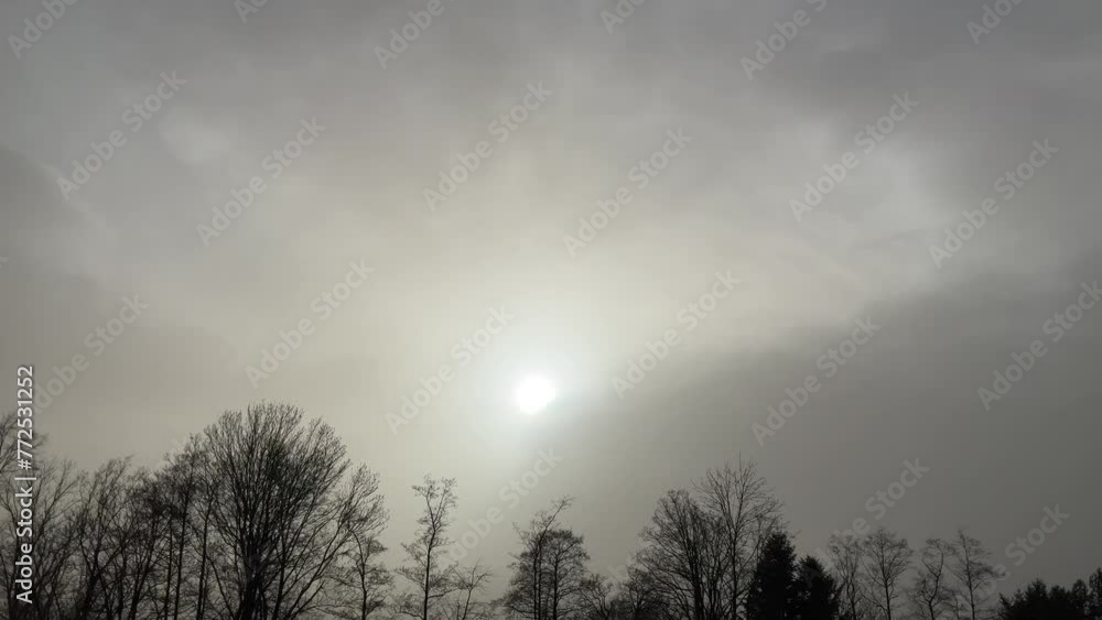 Sky with dust and sand from the Sahara in air, sun above horizon with ...
