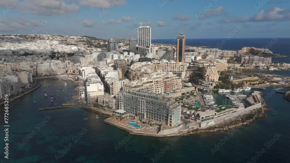 Vidéo Stock An aerial view of St Julian's seaside town in Malta on a ...