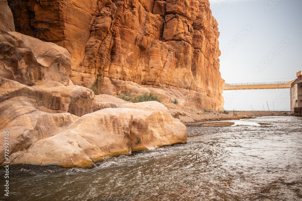 Rocky Scenery with Water Stream and Bridge at Wadi Mujib. Beautiful ...