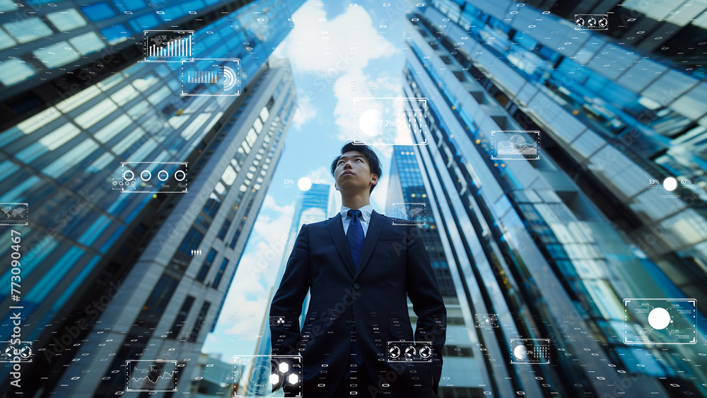 business professionals gazing at skyscrapers with digital data ...