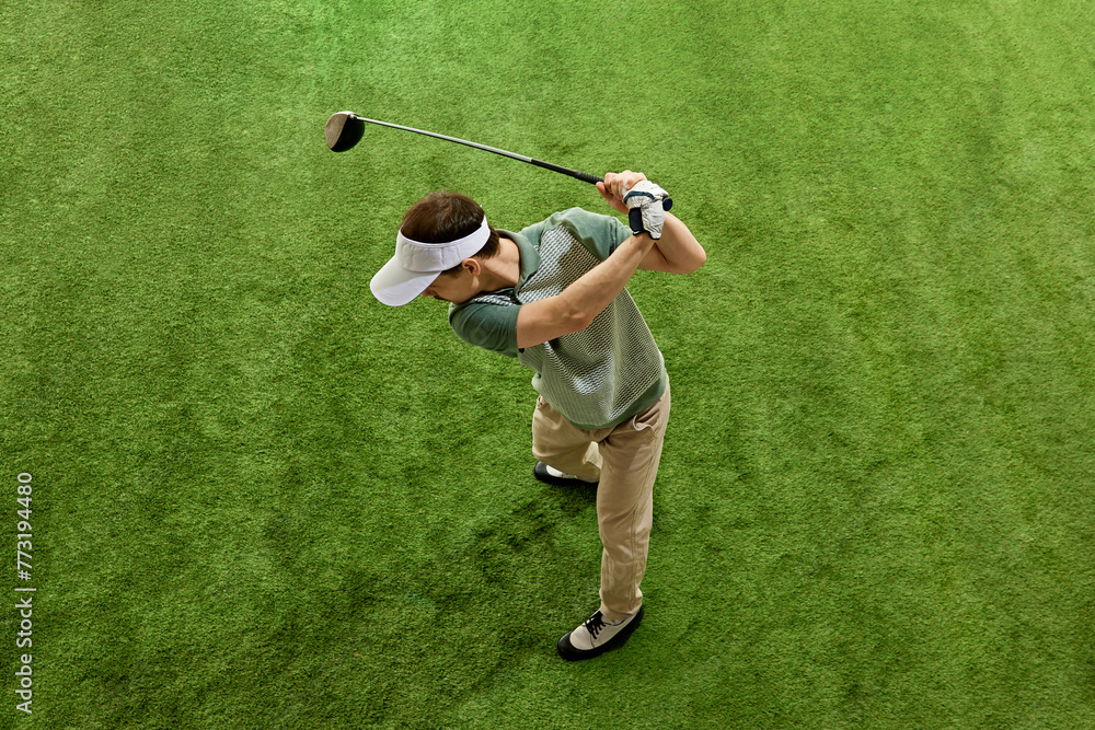 Poster Top-view portrait of male golfer, skilled, focused on game golf ...