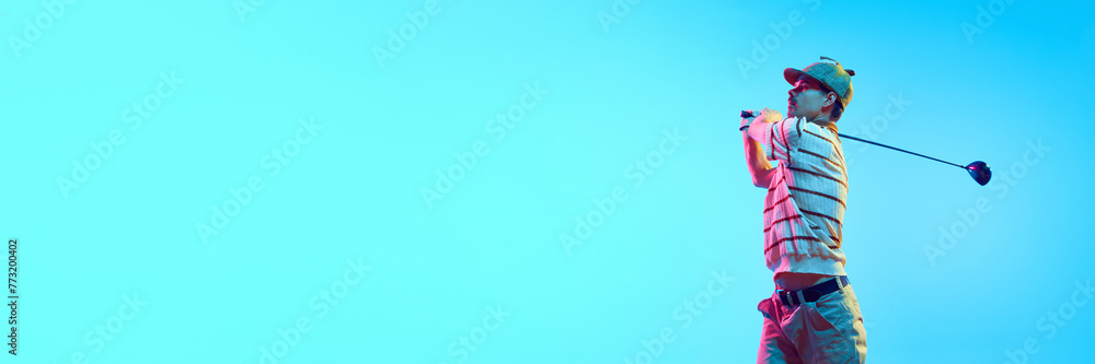Banner. Skilled golfer in retro attire hitting golf shot with club in ...
