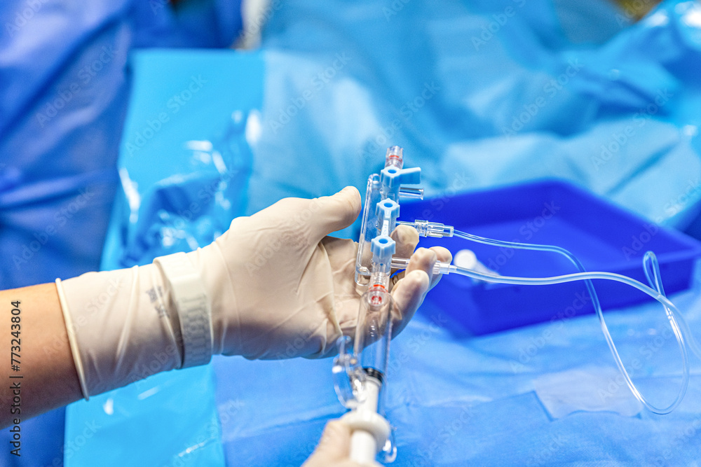 The procedure of inserting a double lumen catheter into a patient with ...