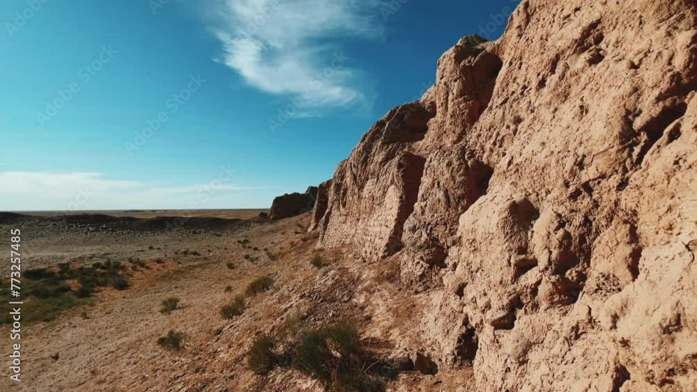 Turkestan walls of the ancient city of Sauran on a sunny day with a ...