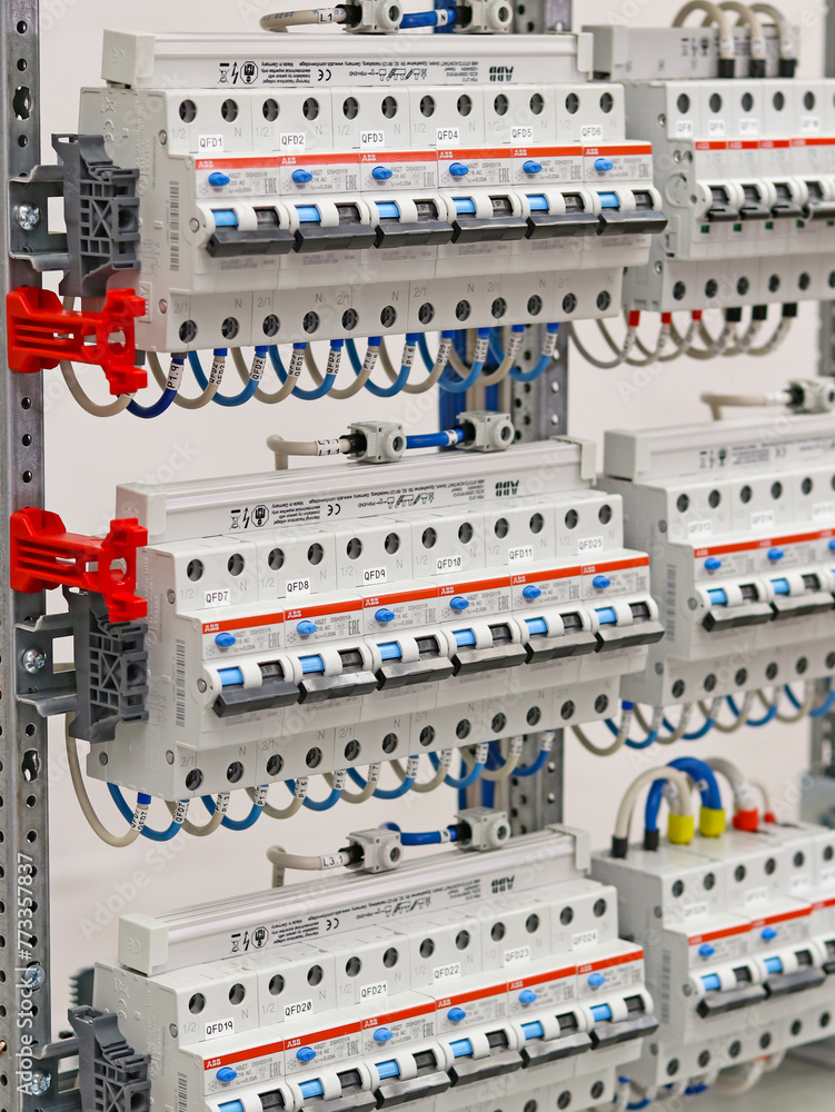 Electric current circuit breakers to protect loads in an electrical ...