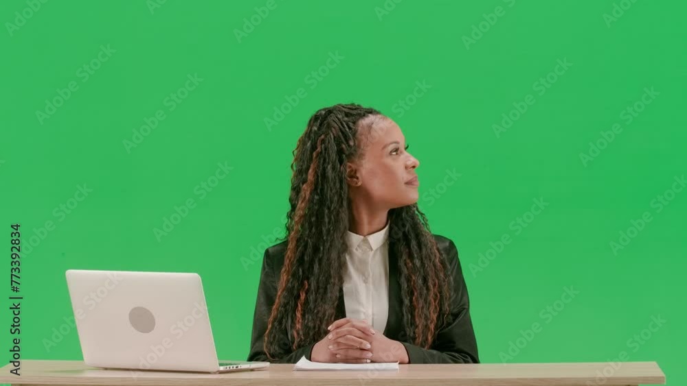 Female reporter at the desk isolated on chroma key green screen ...