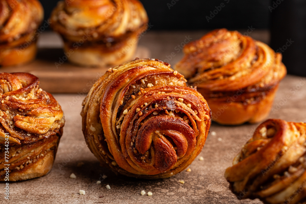 Homemade buns or cruffins, a hybrid of a croissant and a muffin, filled ...