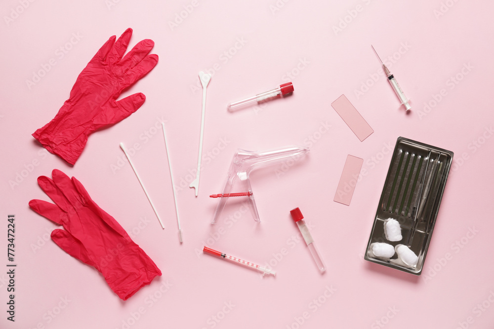 Medical gloves with gynecological speculum, pap smear test tools and ...
