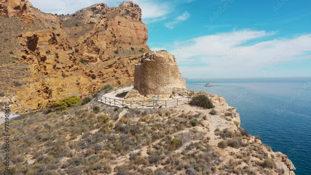 Aerial drone footage of an old rundown ruins of an old fort lookout in ...