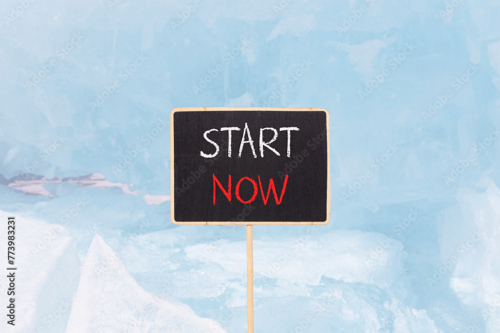 Start now symbol. Concept words Start now on beautiful yellow black ...