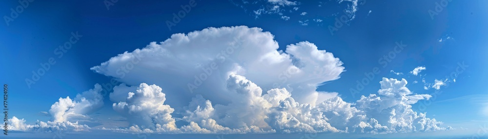 Anvil clouds, towering cumulonimbus with a flat top, powerful and ...
