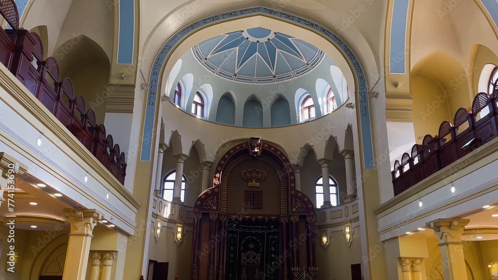 The synagogue building is from the inside. A two-storey hall with a ...