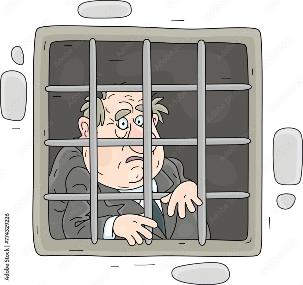Sad corrupt official with a sour face sitting behind bars in a prison ...