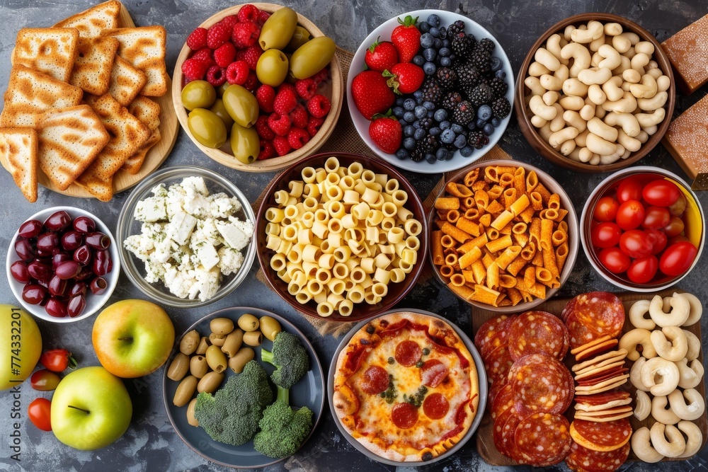 Tray of fried food, fatty food with wings and fries, burgers and ...