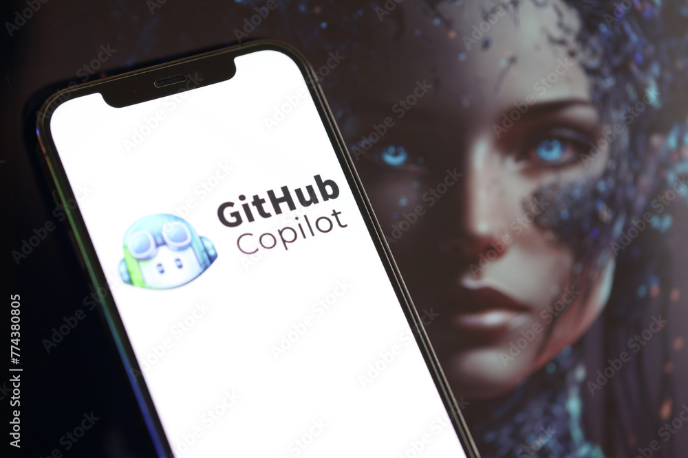 KYIV, UKRAINE - MARCH 17, 2024 Github copilot logo on iPhone display screen with background of ...