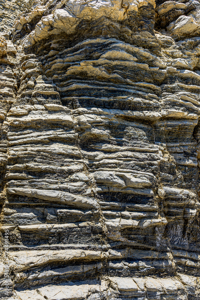 Nature force compressed prominent cracked rock layers structure ...