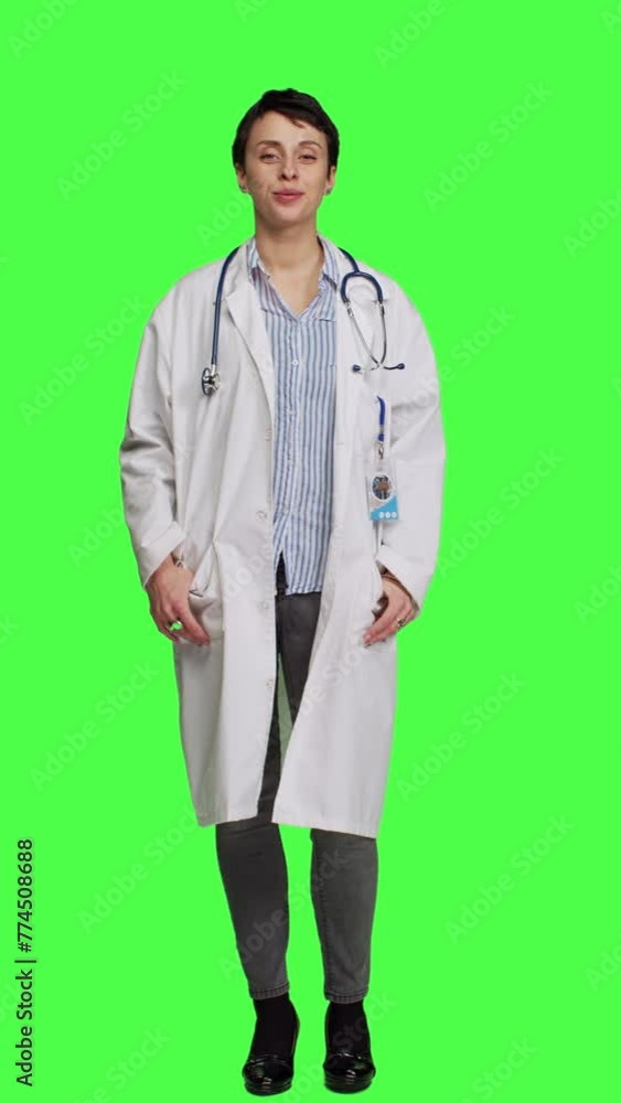 Front view Portrait of physician wearing a white coat and a stethoscope ...