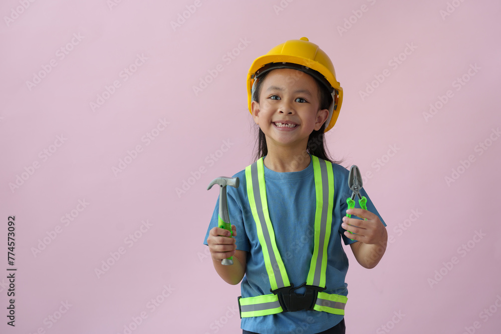 Little handyman with tools Cute child is a construction worker playing ...