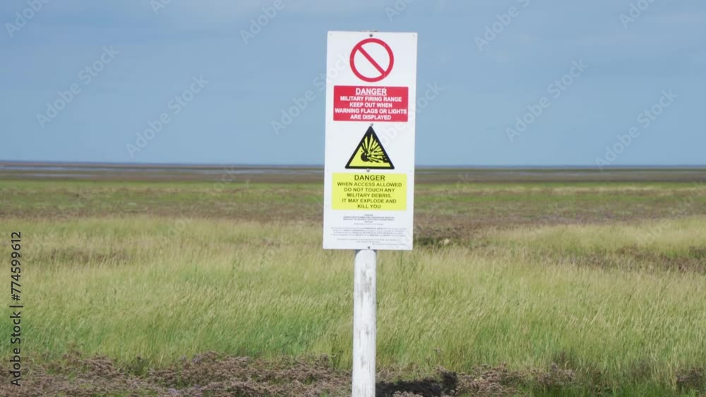 British army base warning signs. Danger of unexploded weapons on a ...