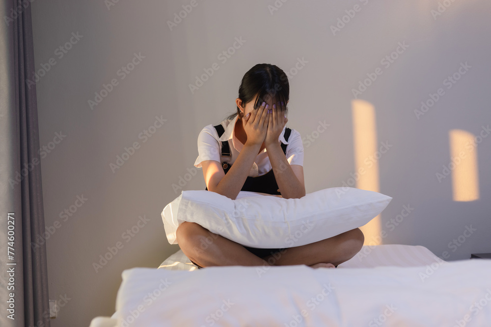 Upset girl feeling lonely and sad sitting on bed, psychological and ...