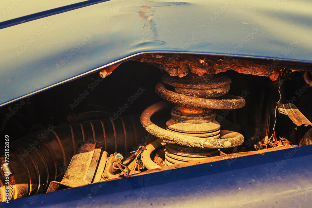 a damaged car, got into an accident. a strut with a shock absorber and ...