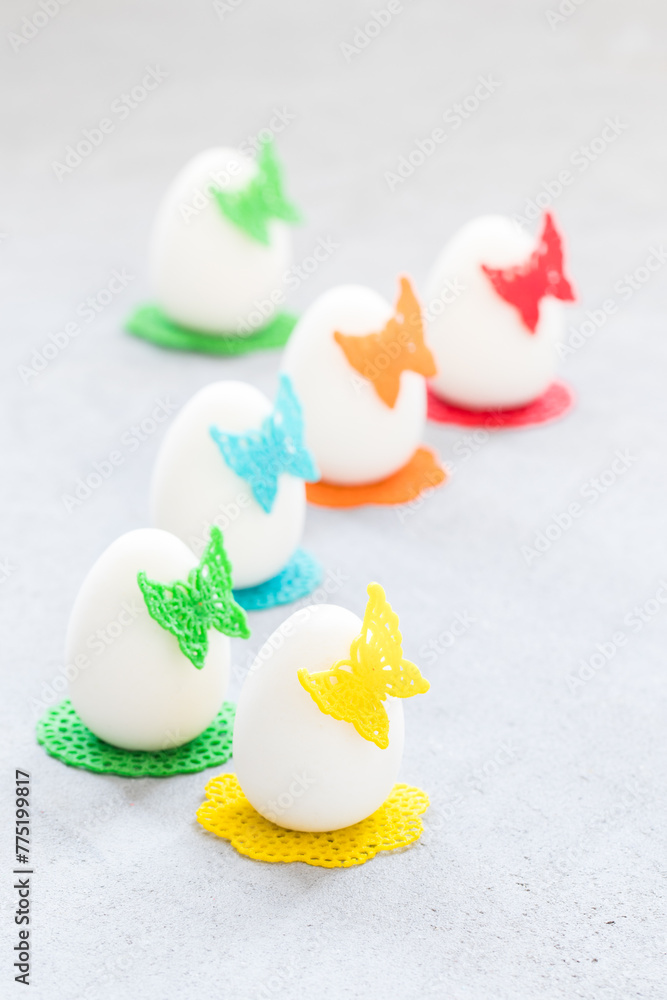 Easter Egg with a butterfly. Creamy white chocolate mousse dessert in ...