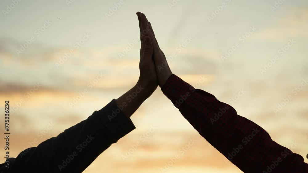 High five hands at sunset silhouette. Best friends buddies clapping ...