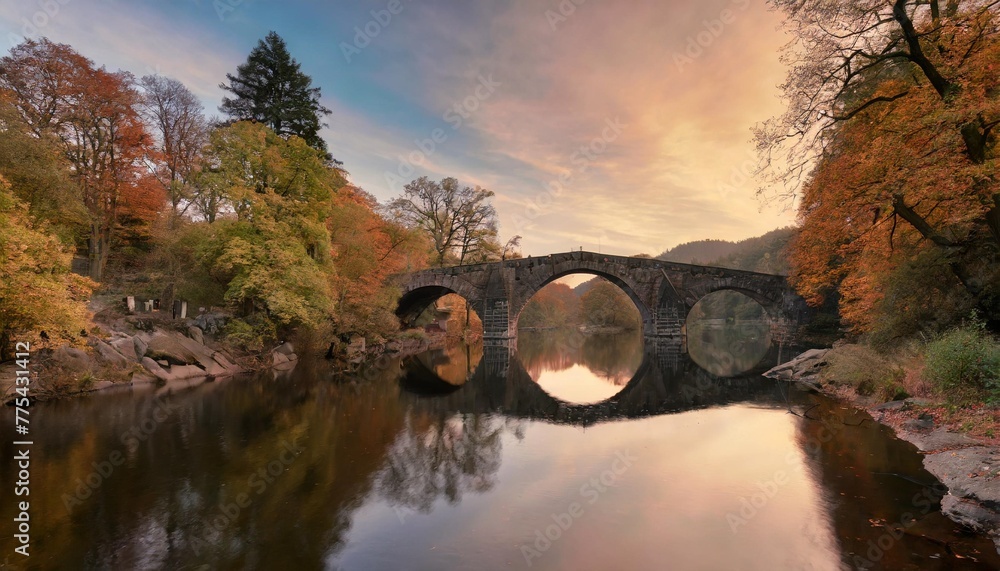 arch bridge in kromlau saxony germany colorful autumn in germany rakotz ...