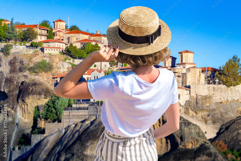 Woman tourist in Cyprus. Girl with her back to camera. Woman admires ...