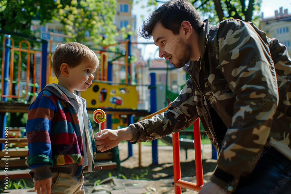 Child abduction or child theft. Stranger with candy in hand on the ...