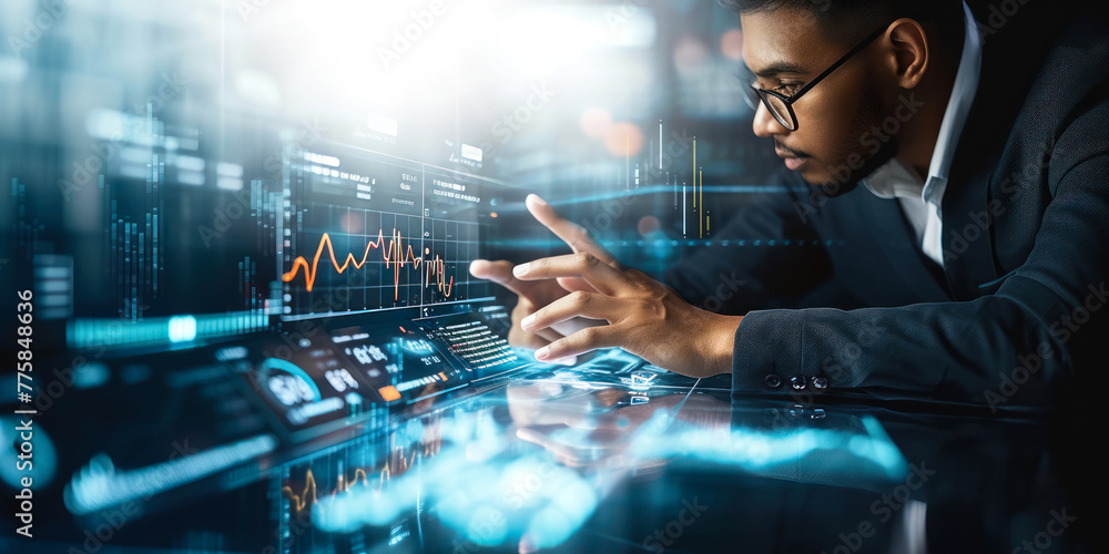 Business analyst interacting with futuristic augmented reality financial graphs, analyzing ...