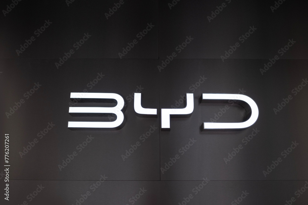 glowing Advertising banners BYD on black background, Chinese ...