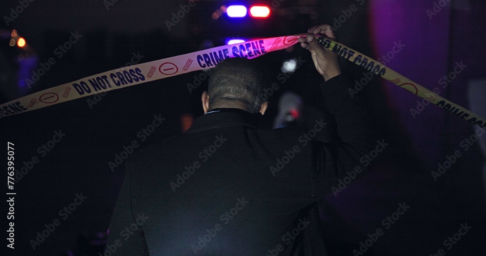 Police officer, man and yellow tape for crime scene, investigation or ...