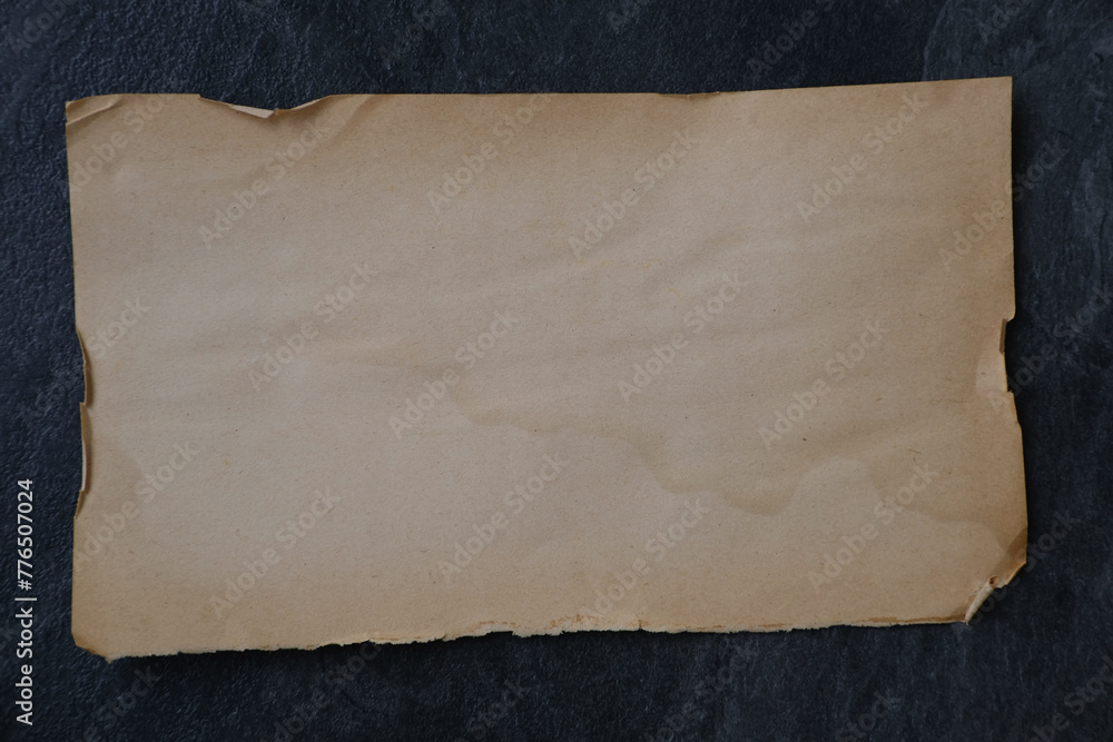 one horizontal textural sheet of paper, stack of sheets old retro paper ...