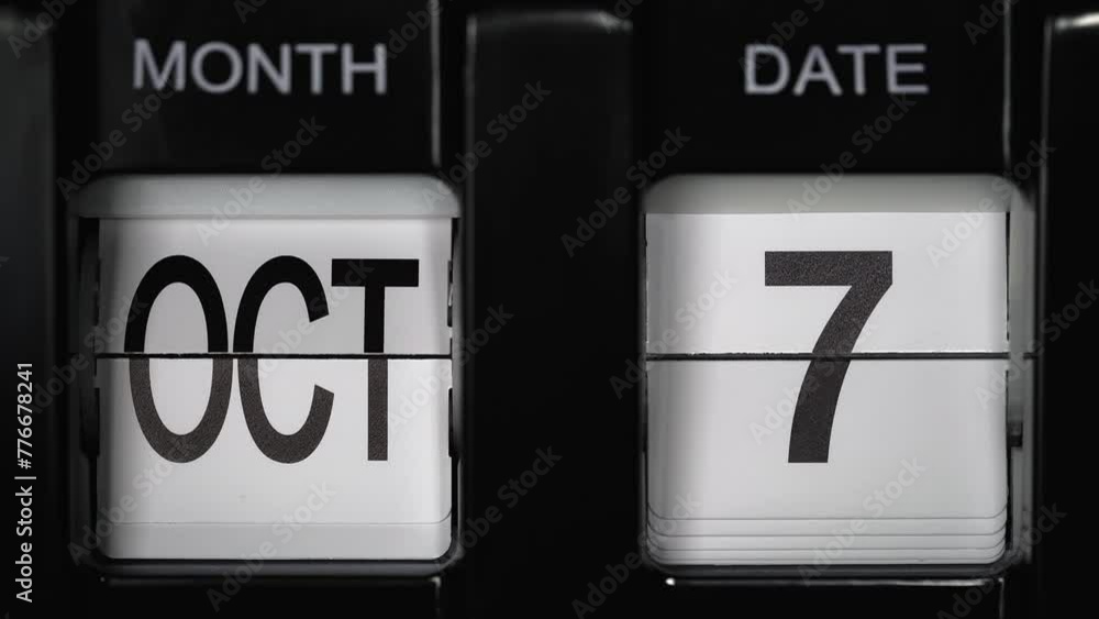 retro flip calendar with a date change from the sixth of October to the ...