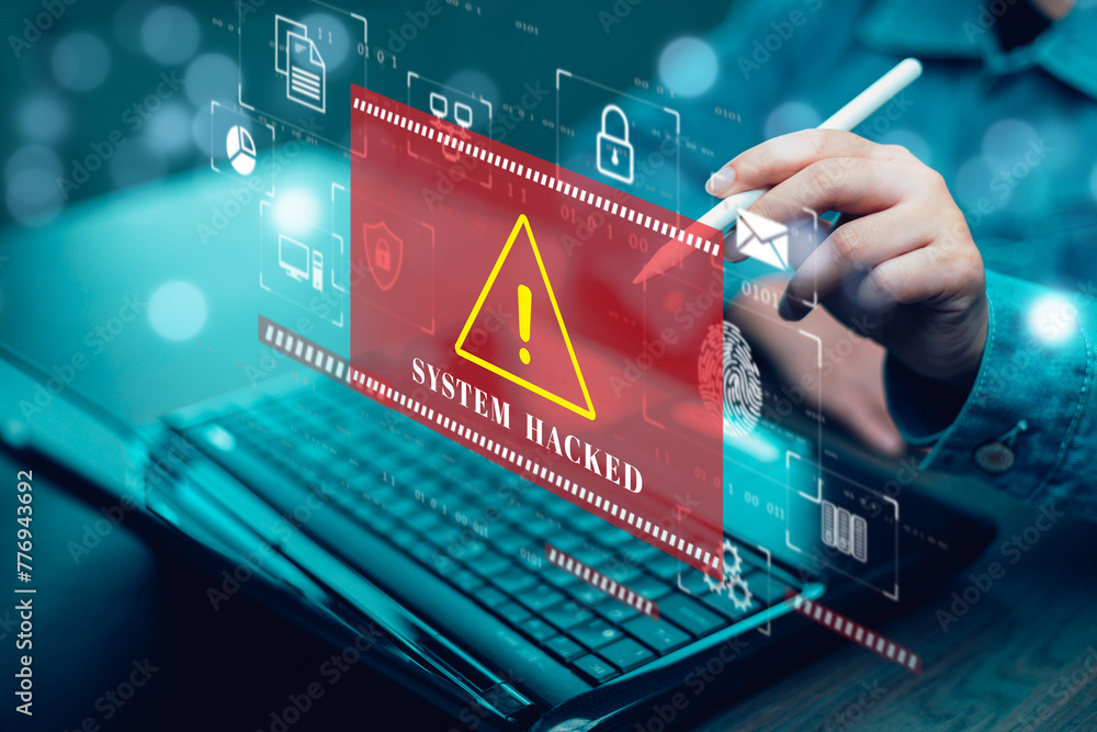 programmer using laptop with triangle caution warning sign for notification error system ...