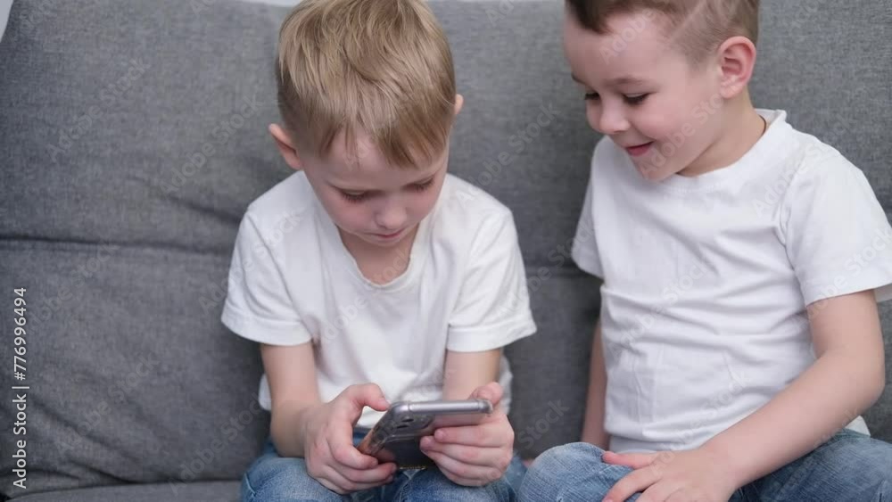 Cheerful smiling caucasian kids preschoolers laughing and using ...